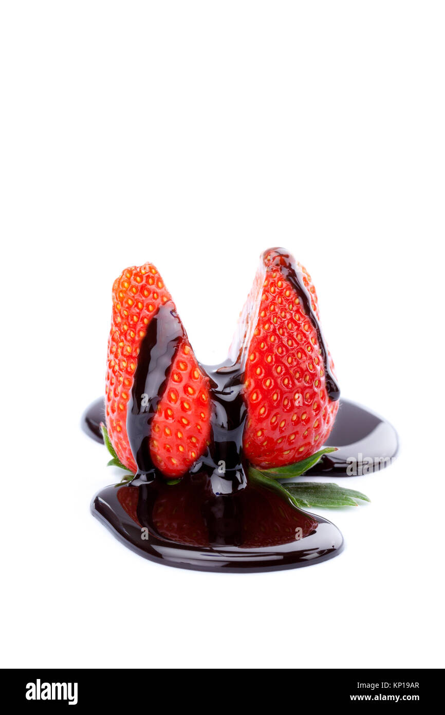 sliced strawberry with melted chocolate Stock Photo - Alamy