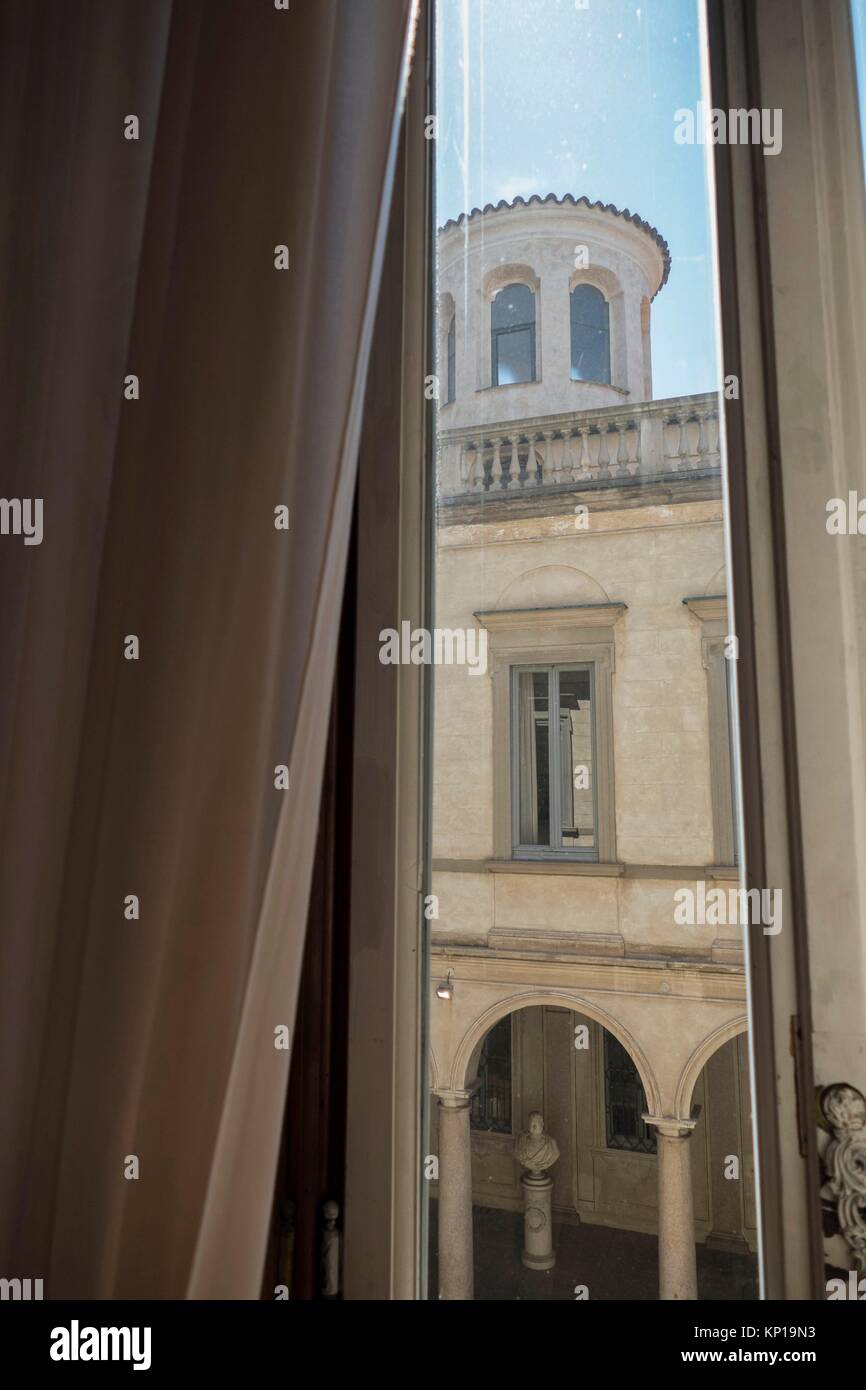 Warm summer breeze through palazzo window looking onto classical ...