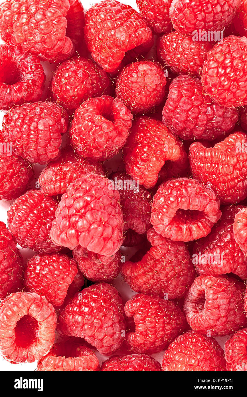 sweet raspberries on a white background Stock Photo - Alamy