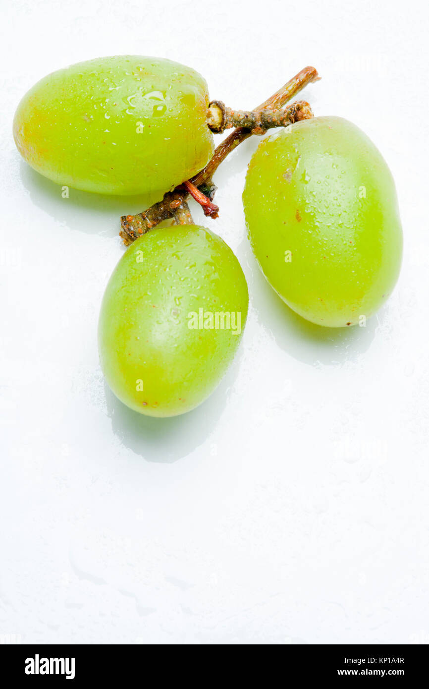 three green grapes Stock Photo - Alamy
