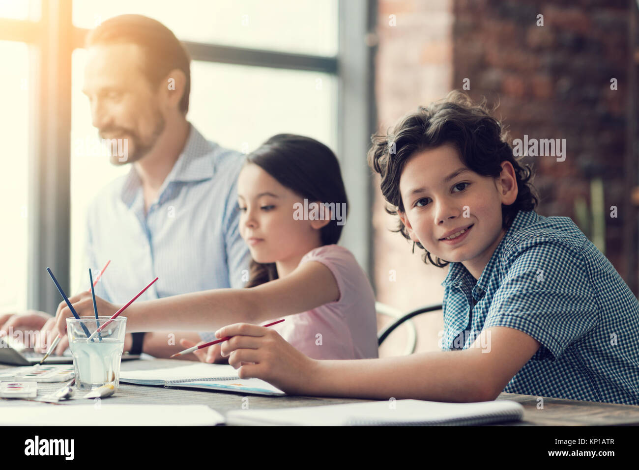 Happy cute boy looking at you Stock Photo - Alamy