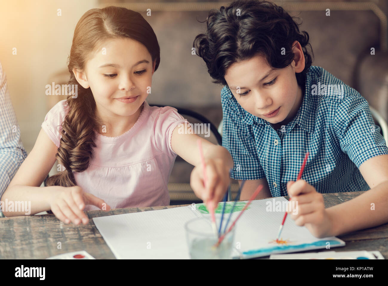 Delighted nice kids enjoying the activity Stock Photo - Alamy