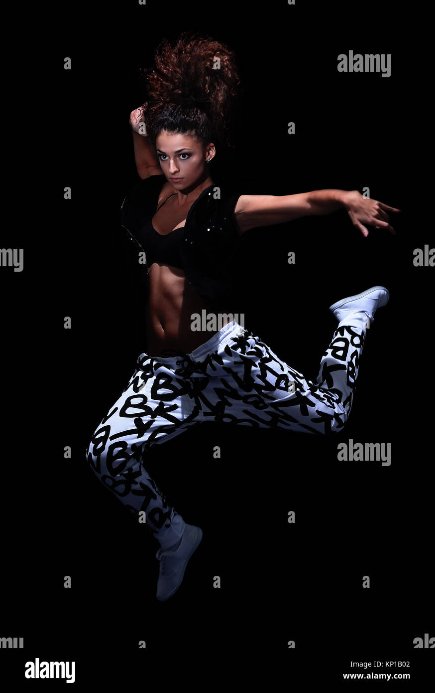 young woman jumping in the style of street dance Stock Photo - Alamy