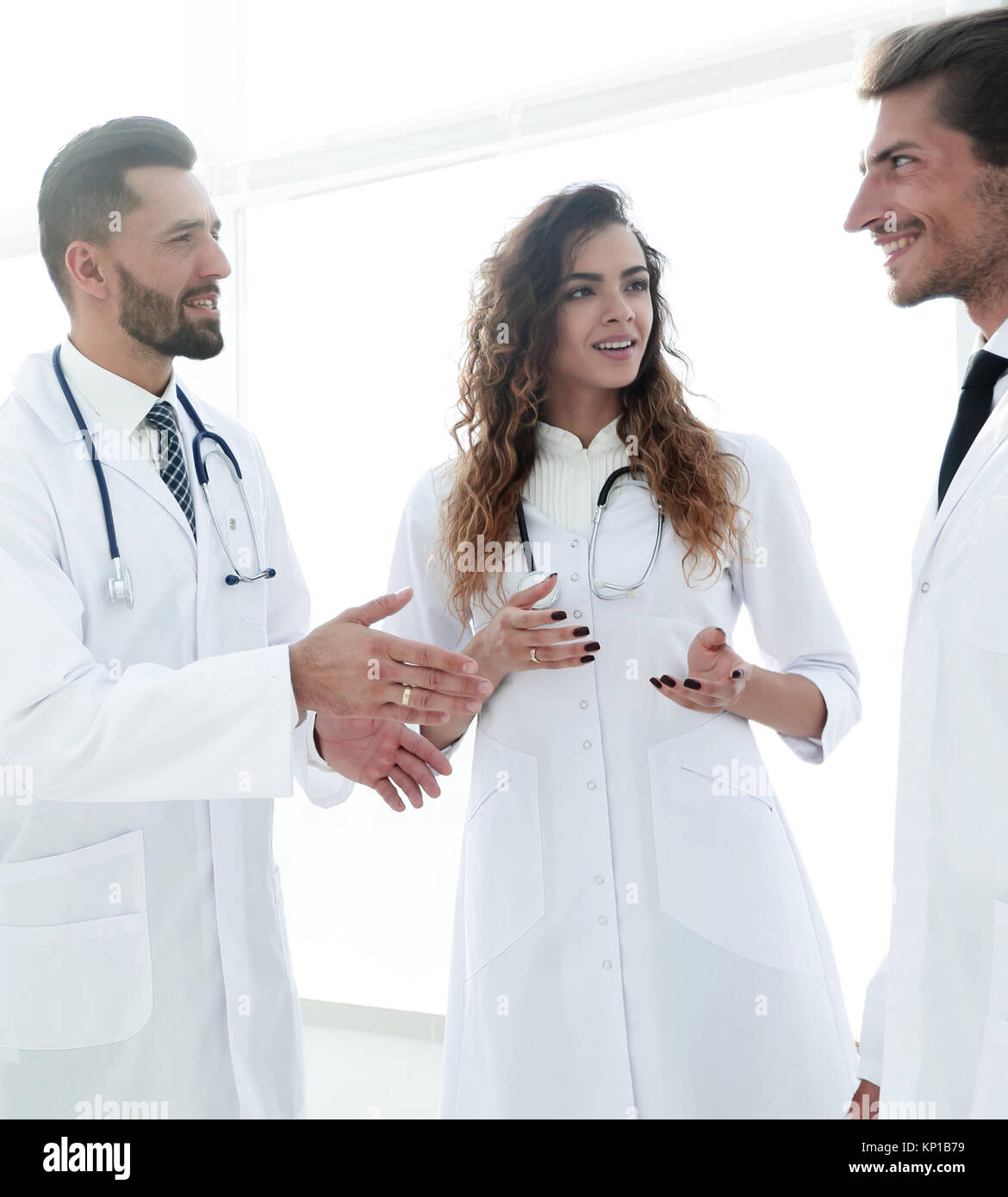 closeup of a group of doctors discussing Stock Photo - Alamy
