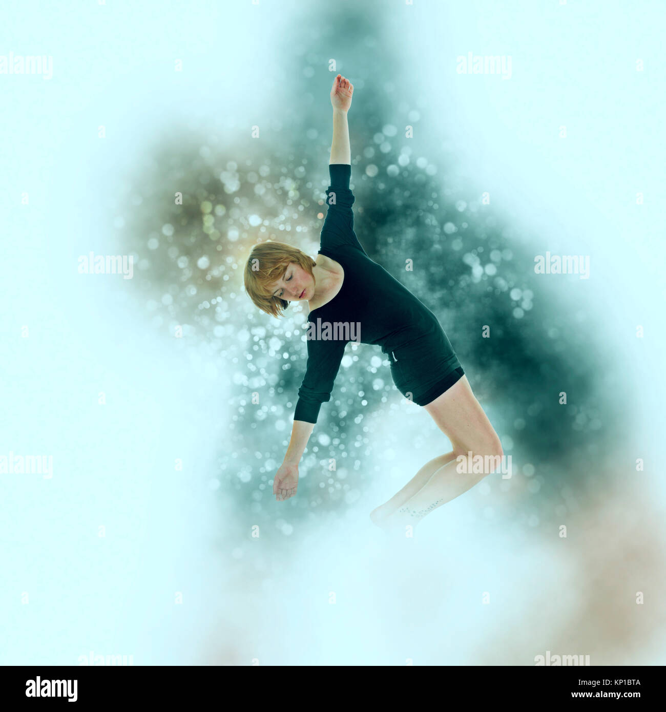 Digitally enhanced image of a Female Contemporary Dancer bending ...