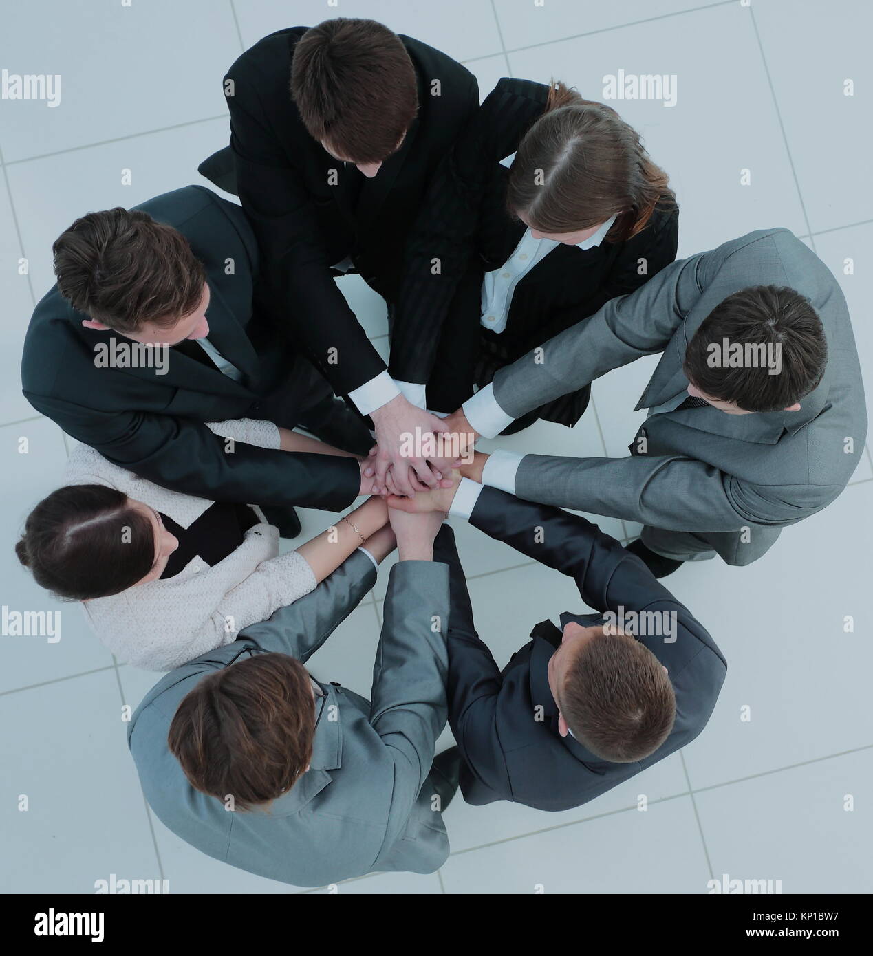 concept of the team .standing in a circle of friendly business t Stock ...