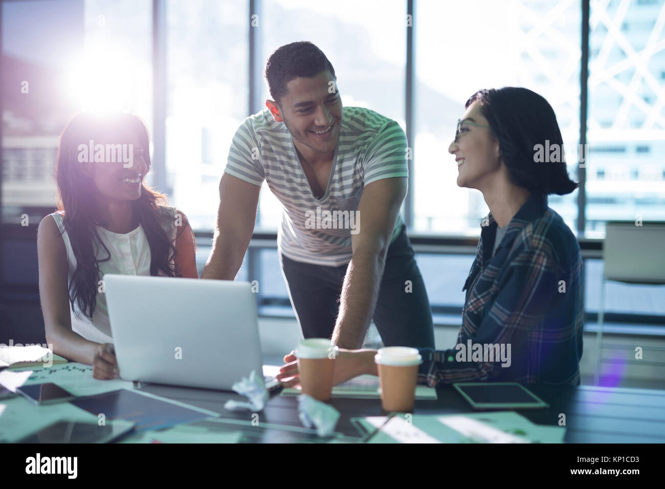 Group of executives working together in office Stock Photo - Alamy