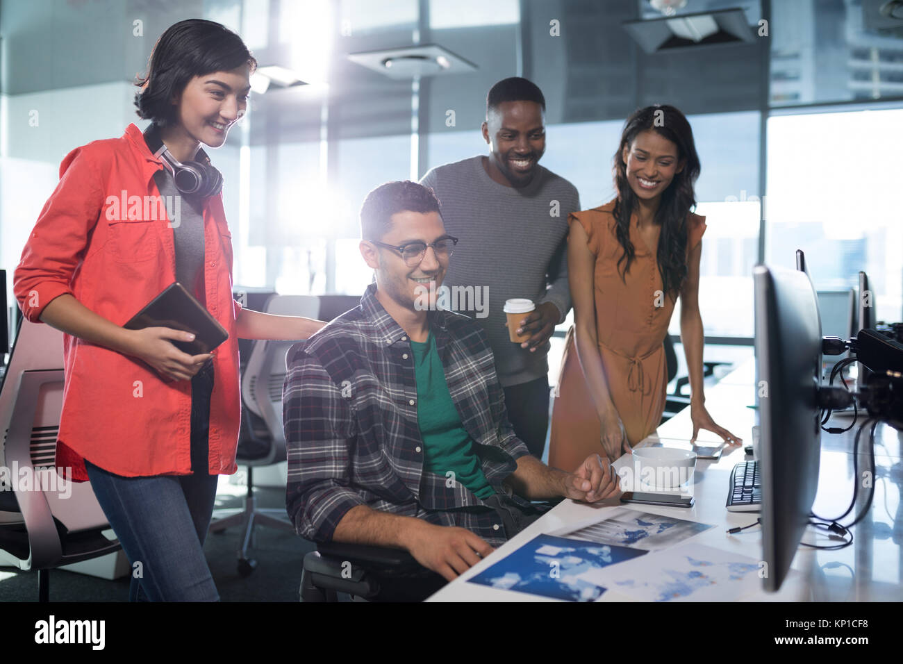 Business executives working at desk in office Stock Photo - Alamy