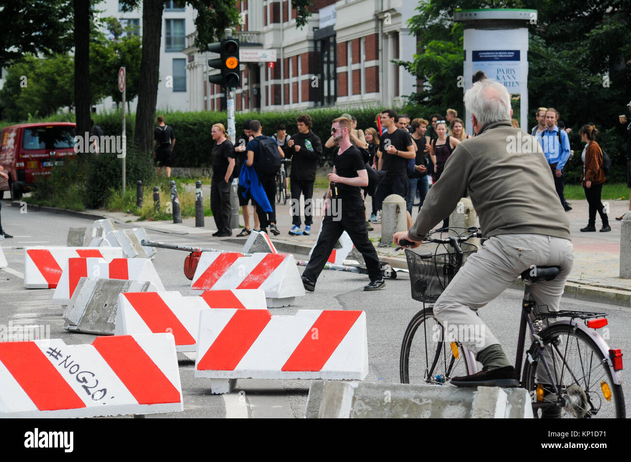G20 summit: Rioters build barricades to block riot police forward ...