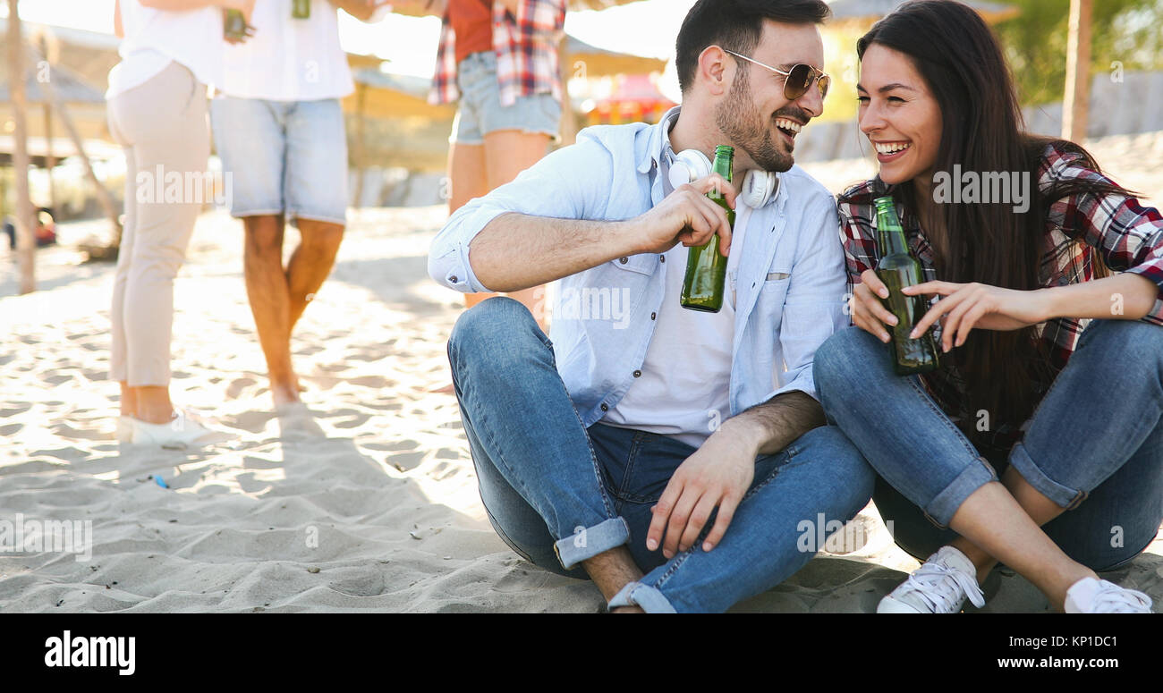 Group people partying tropical beach hi-res stock photography and ...