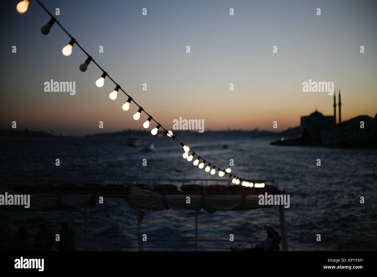 Diagonal bulb lights on row in bosphorus, Istanbul Turkey Stock Photo ...