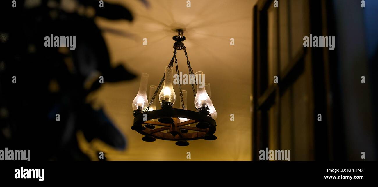 Gas fired ceiling lamp hanging inside - Panoramic view Stock Photo - Alamy