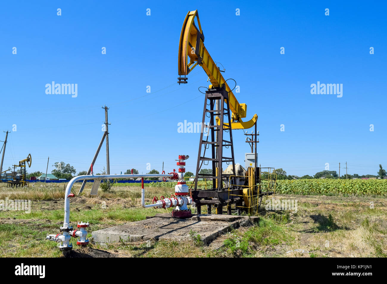The pumping unit as the oil pump installed on a well. Equipment of oil ...