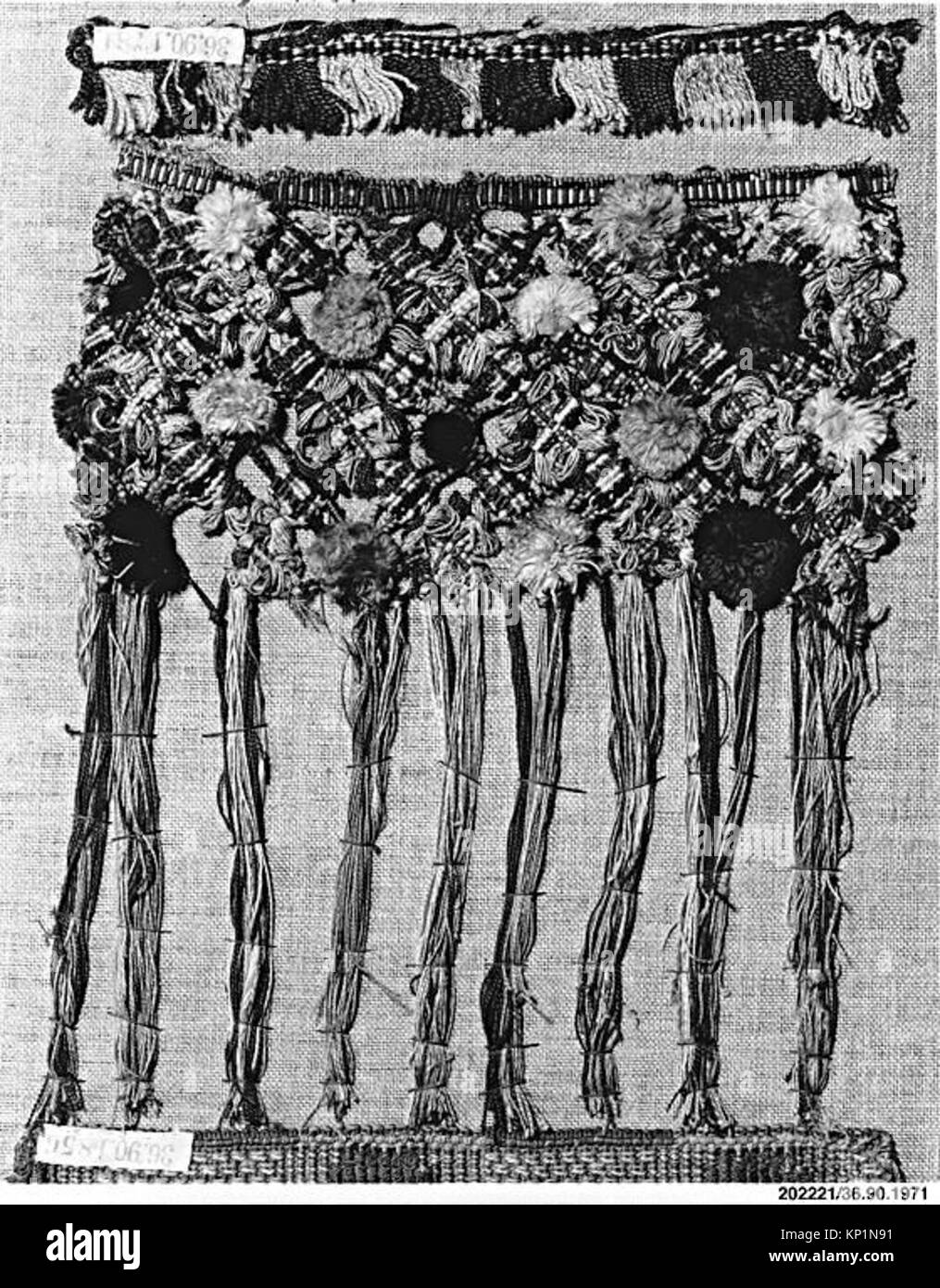 This MET fringe is a textile trim used historically in clothing and ...