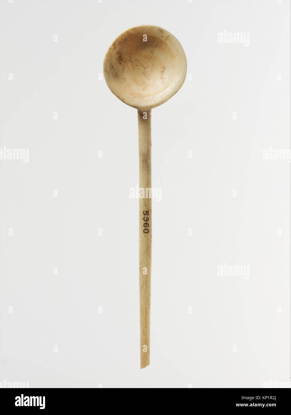 This MET bone spoon (DP121082, 244078) is preserved as an example of ...