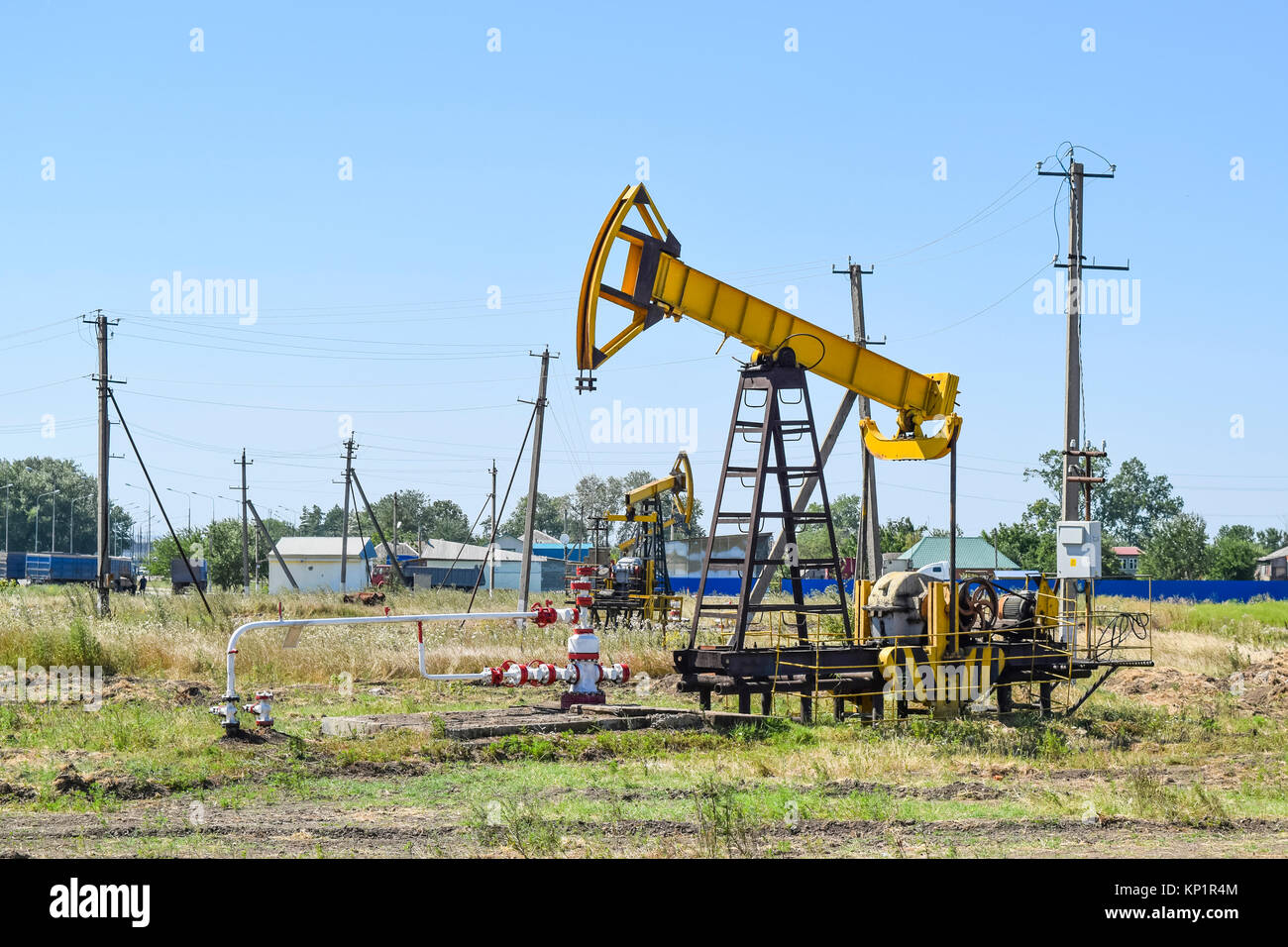 The pumping unit as the oil pump installed on a well. Equipment of oil ...