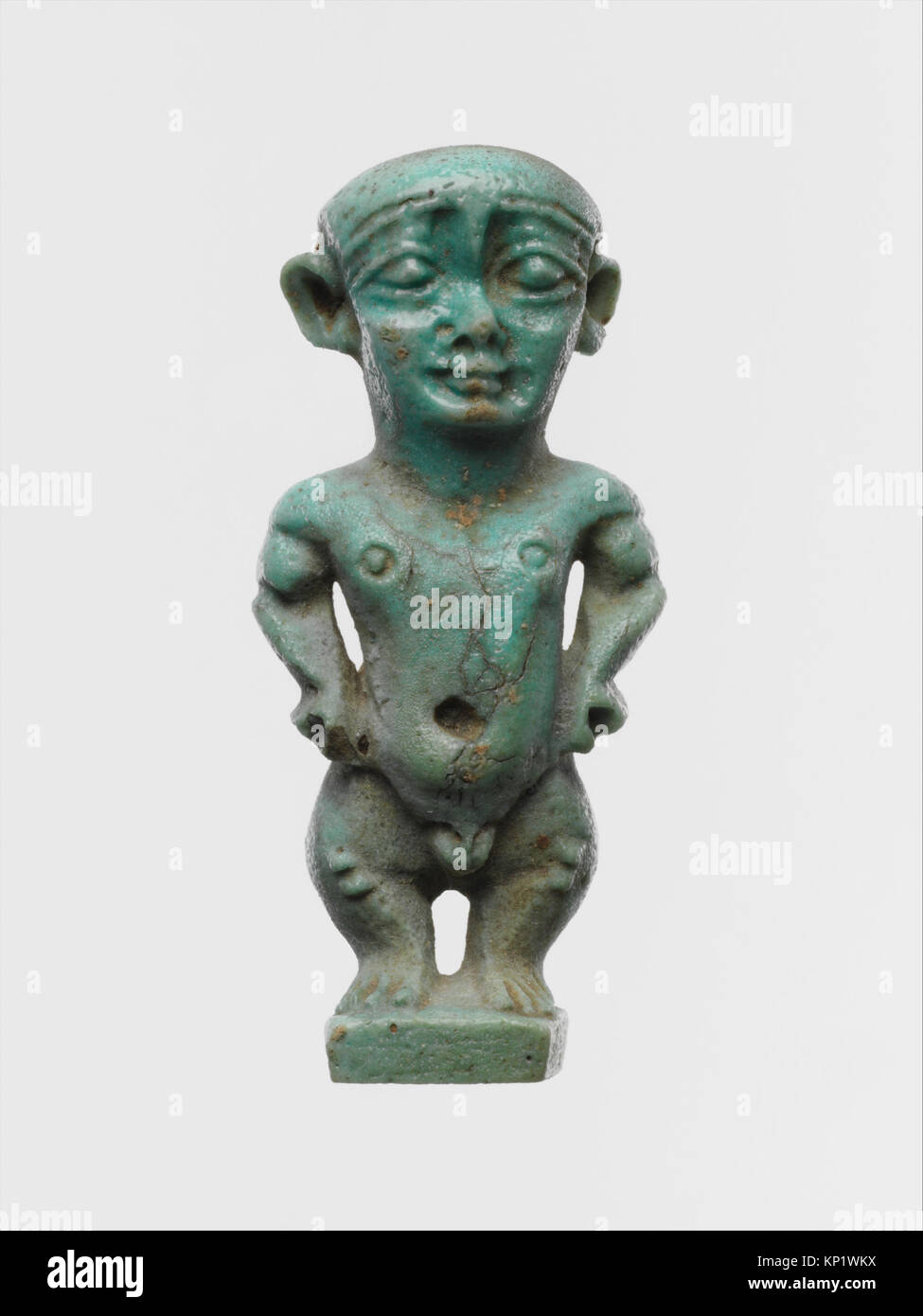 Ancient Egyptian faience amulet shaped as the dwarf deity Pataikos ...