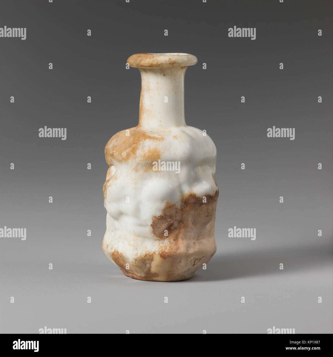 An ancient hexagonal glass bottle preserved as a small vessel ...