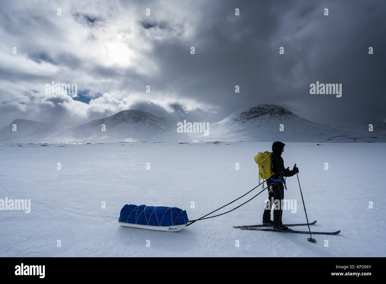 Ski touring in Swedish Lapland, in Kebnekaise massive mountain range ...