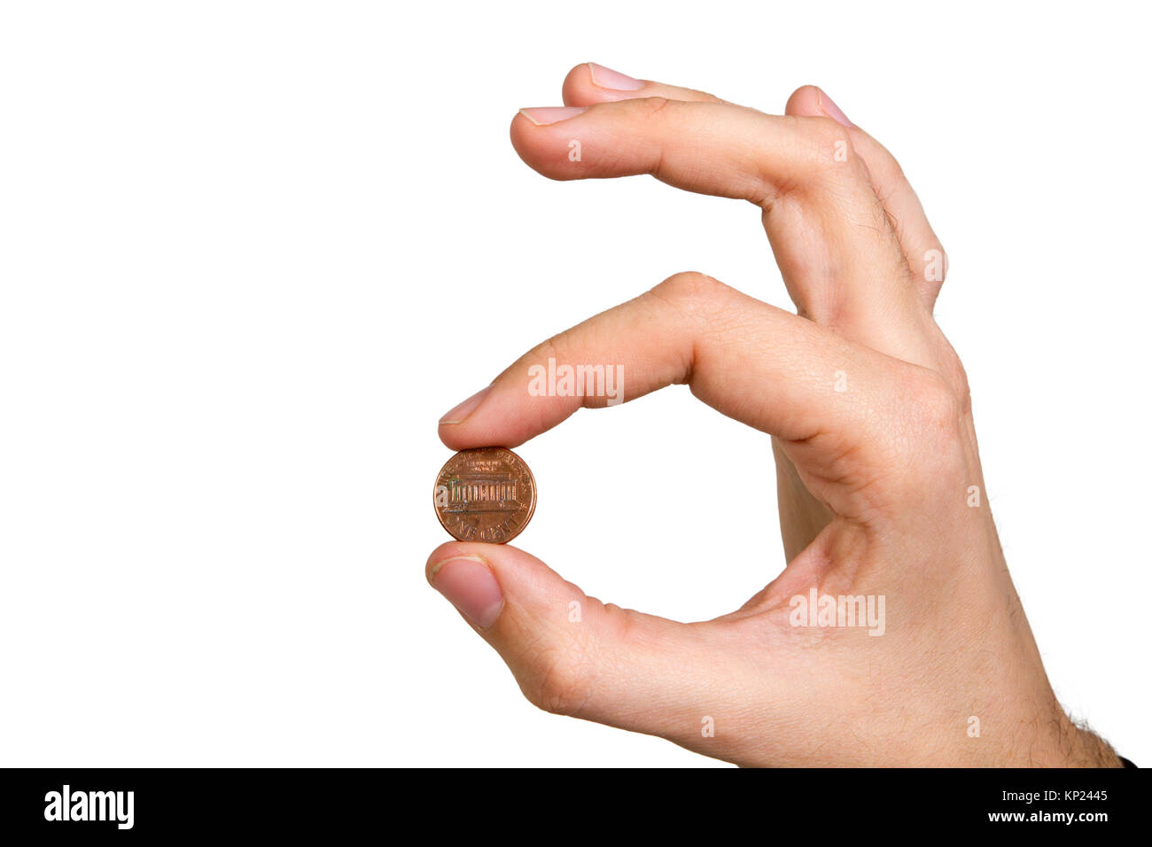 man's hand holding coin isolated on white background Stock Photo - Alamy