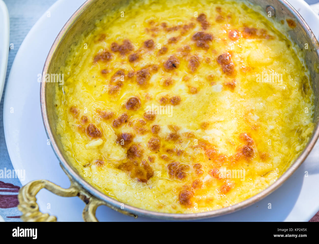 Traditional Turkish meal Kuymak,Guymak(Fried chees and corn flour) is ...