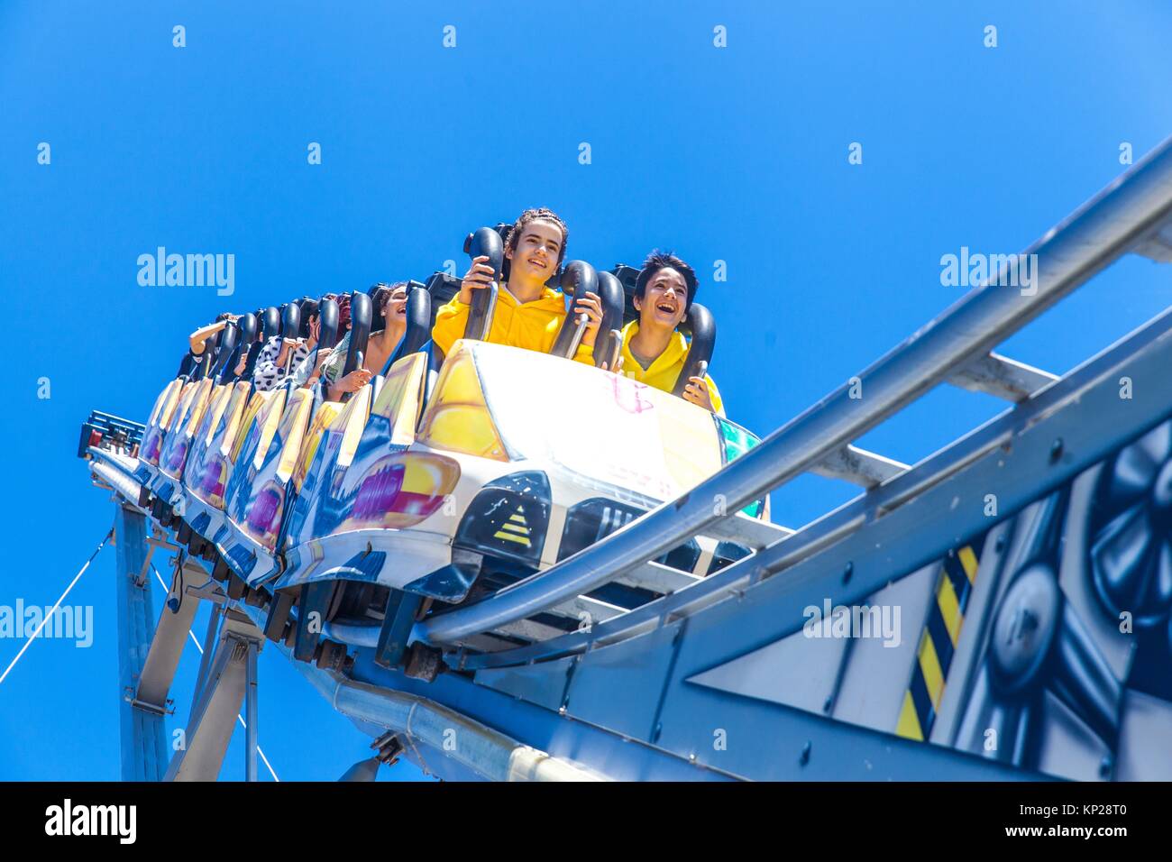 People Taking A Ride In A Fairground Attraction In Tenerife Island people-taking-a-ride-in-a-fairground-attraction-in-tenerife-island