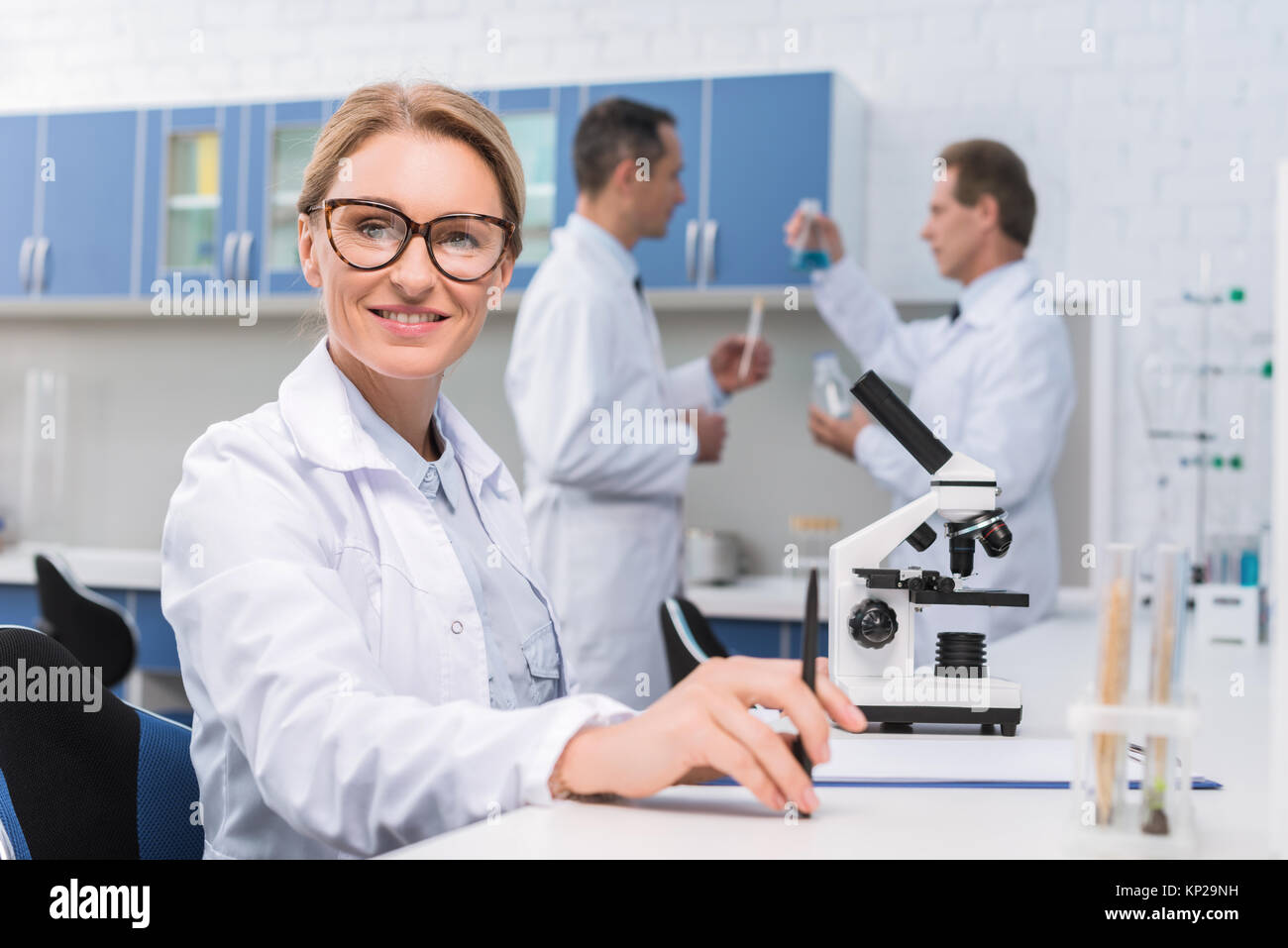 Scientist working in lab Stock Photo - Alamy