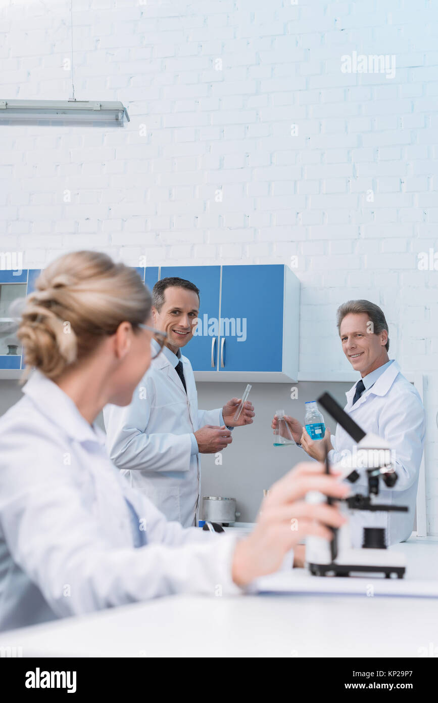 Chemists discussing work Stock Photo - Alamy