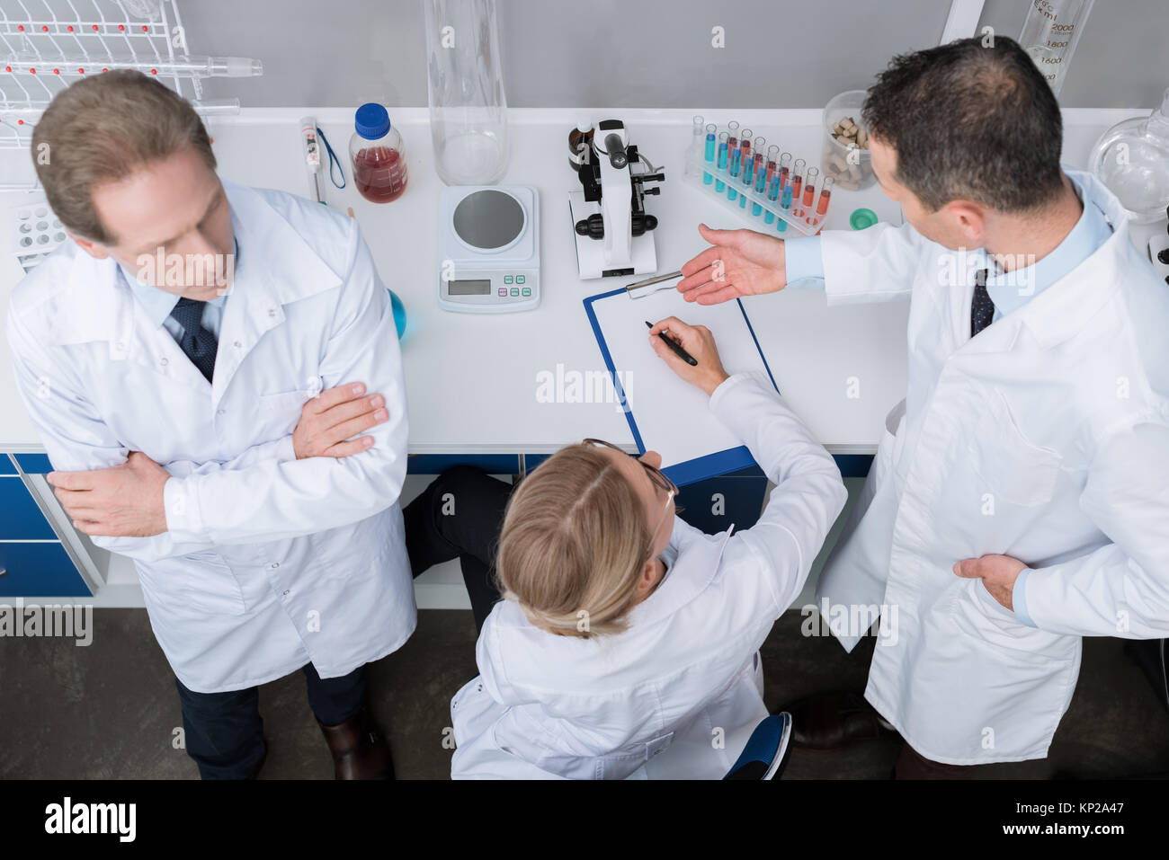 scientists working in laboratory Stock Photo - Alamy