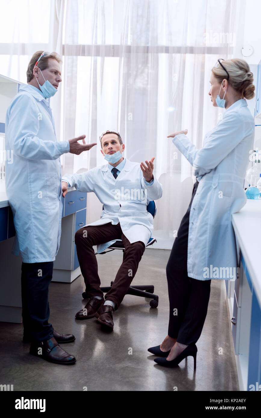 Scientists discussing work Stock Photo - Alamy