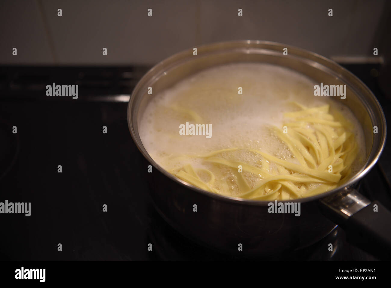 food photography image in color of a saucepan with water boiling and ...