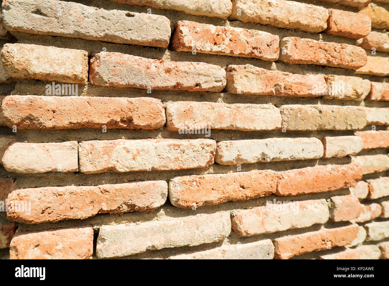 Old orange brick wall close up Stock Photo - Alamy