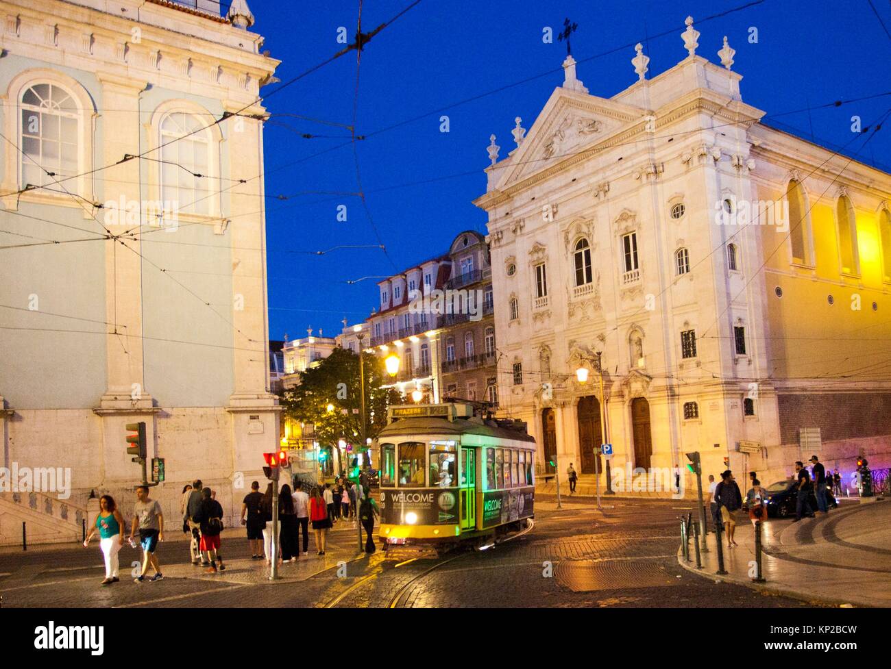 Tram, at right Church of Our Lady of the Incarnation from Luís Camoes ...