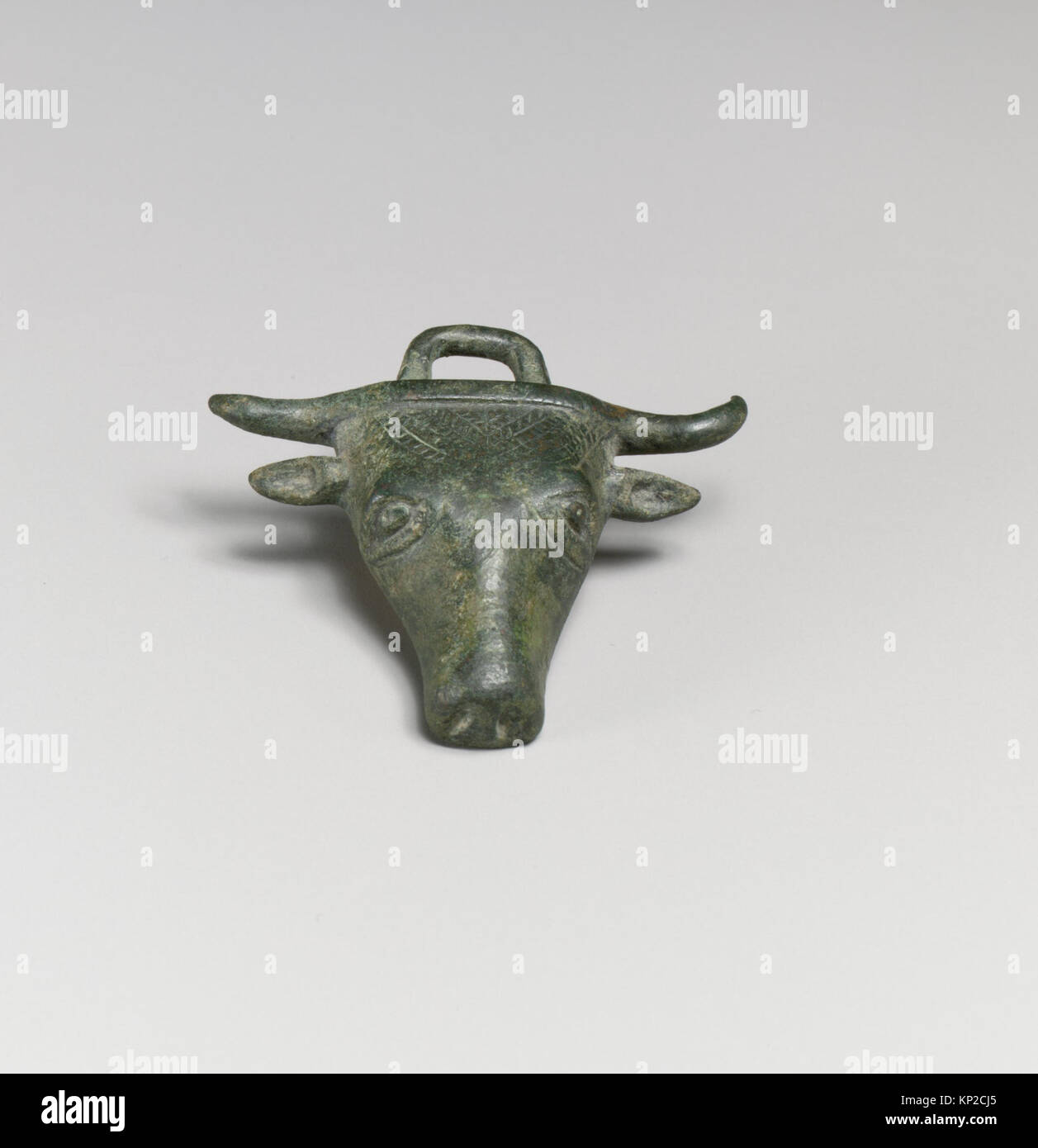 Roman bronze decorative applique in the shape of a bull's head, used on ...