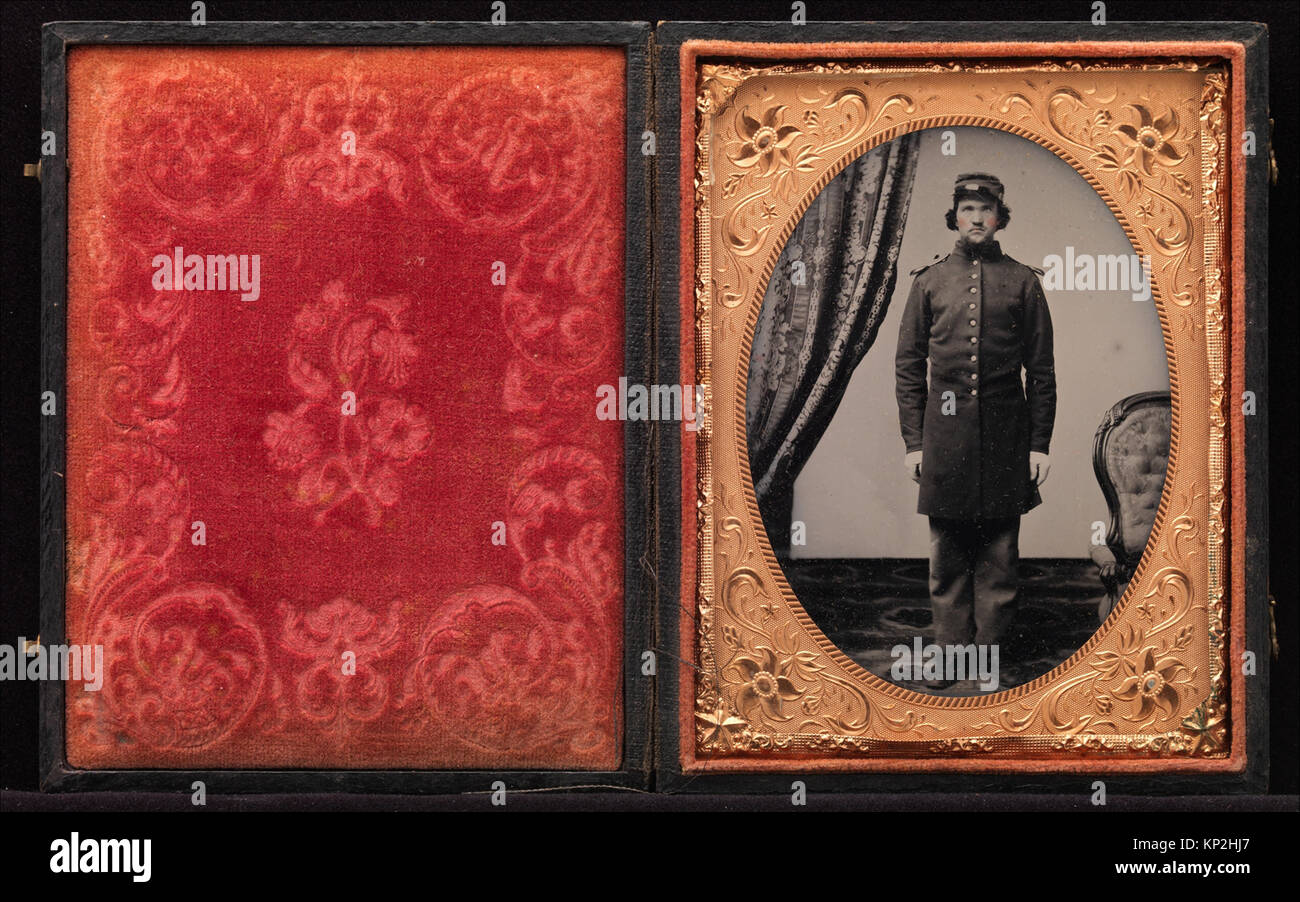 Portrait of a Union officer standing at attention, showing uniform ...