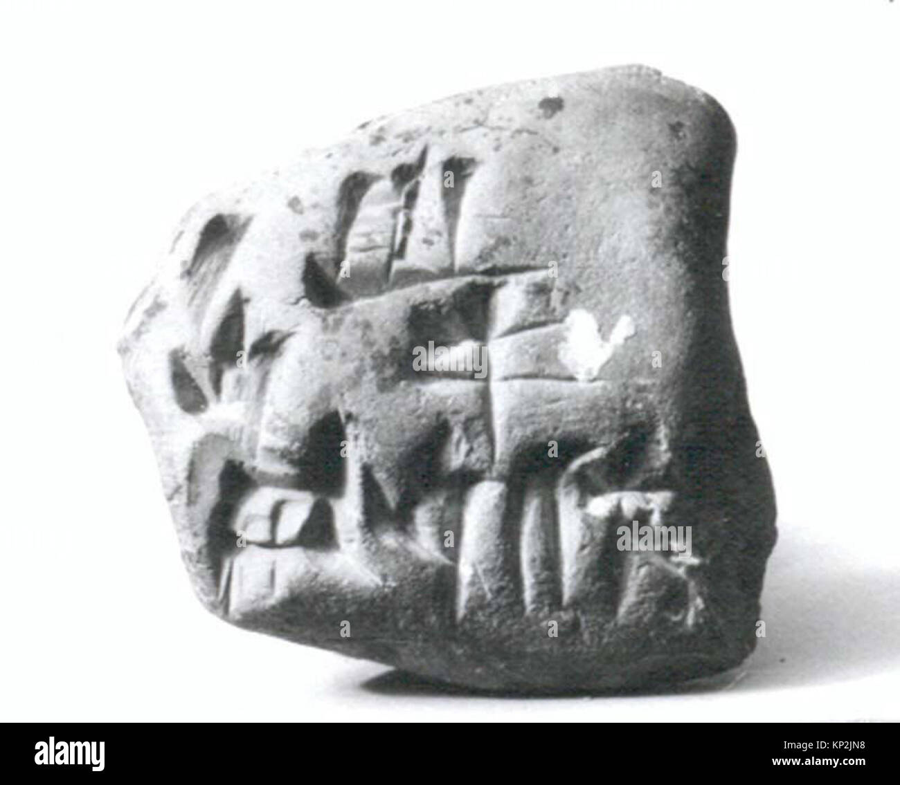 This clay tablet from ancient Mesopotamia features a cuneiform ...