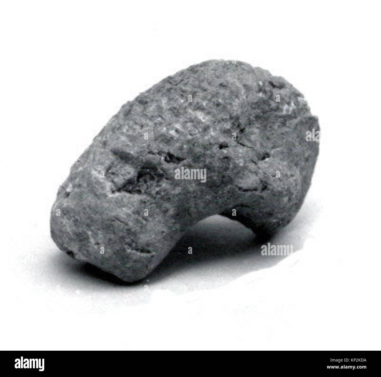 A bird head sculpture with an inscription of Ashurbanipal from the ...