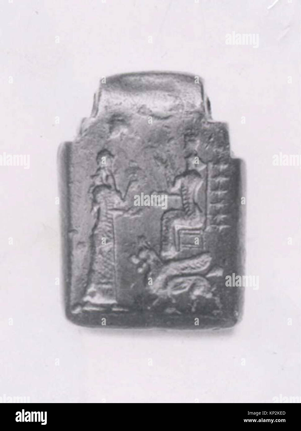 Amulet with fighting demons; on reverse- Ishtar enthroned and worshiper ...