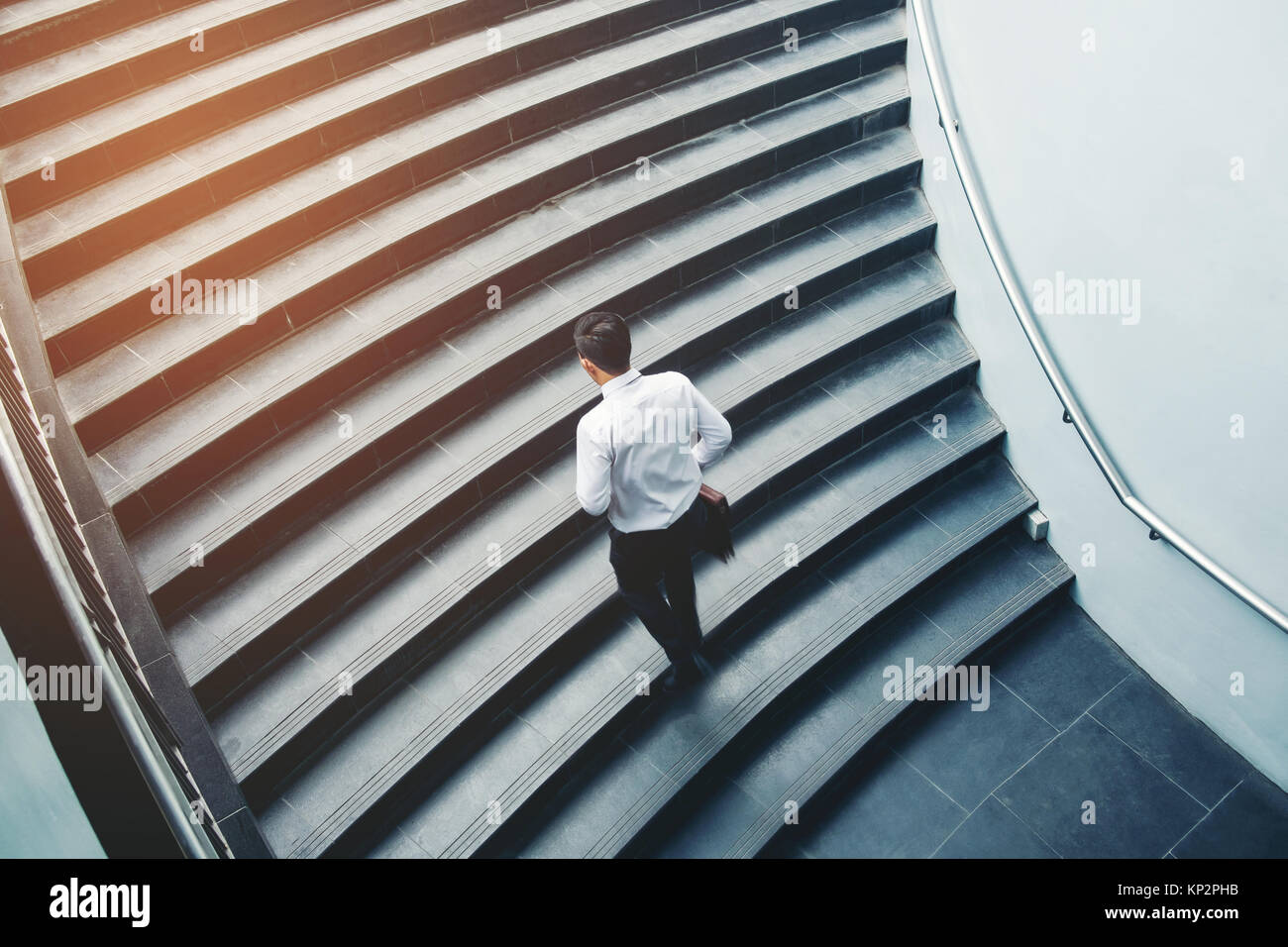 Businessman running fast upstairs Growth up Success concept Stock Photo ...