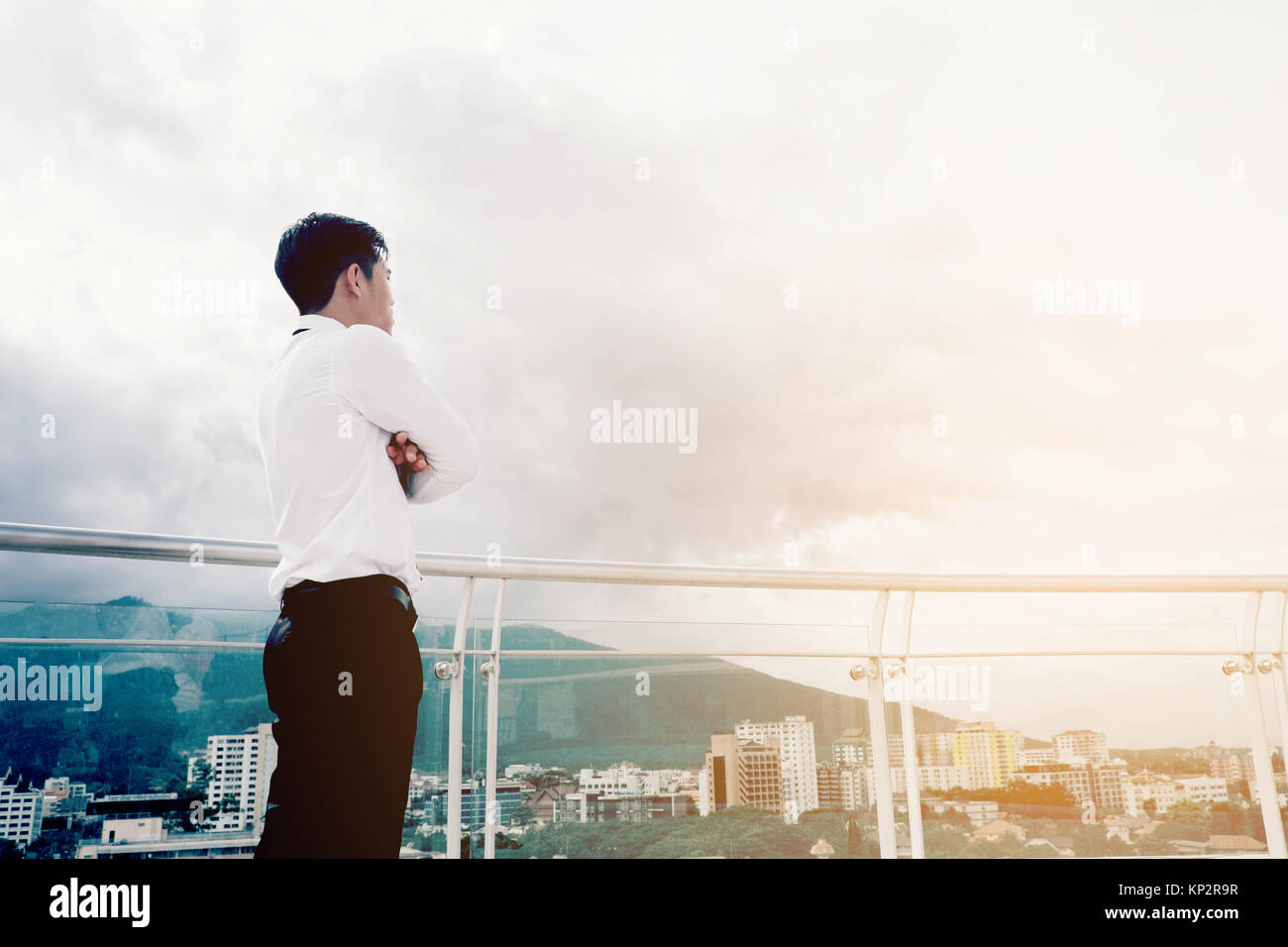 Back view of success Business man looking view the city Stock Photo - Alamy
