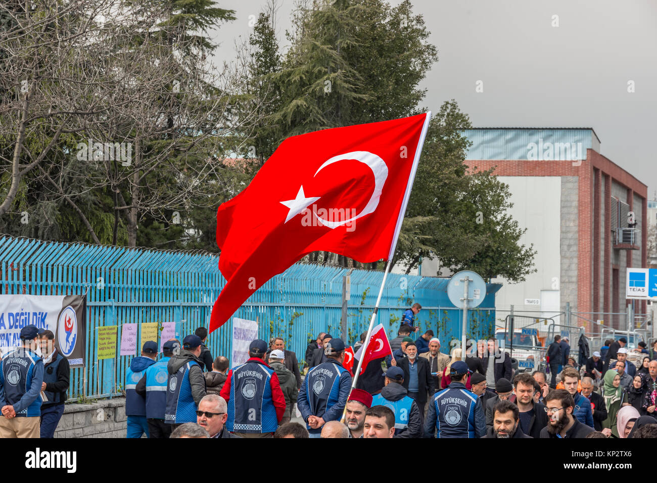 AKP (Justice and Development Party) supporters shout slogans and wave ...
