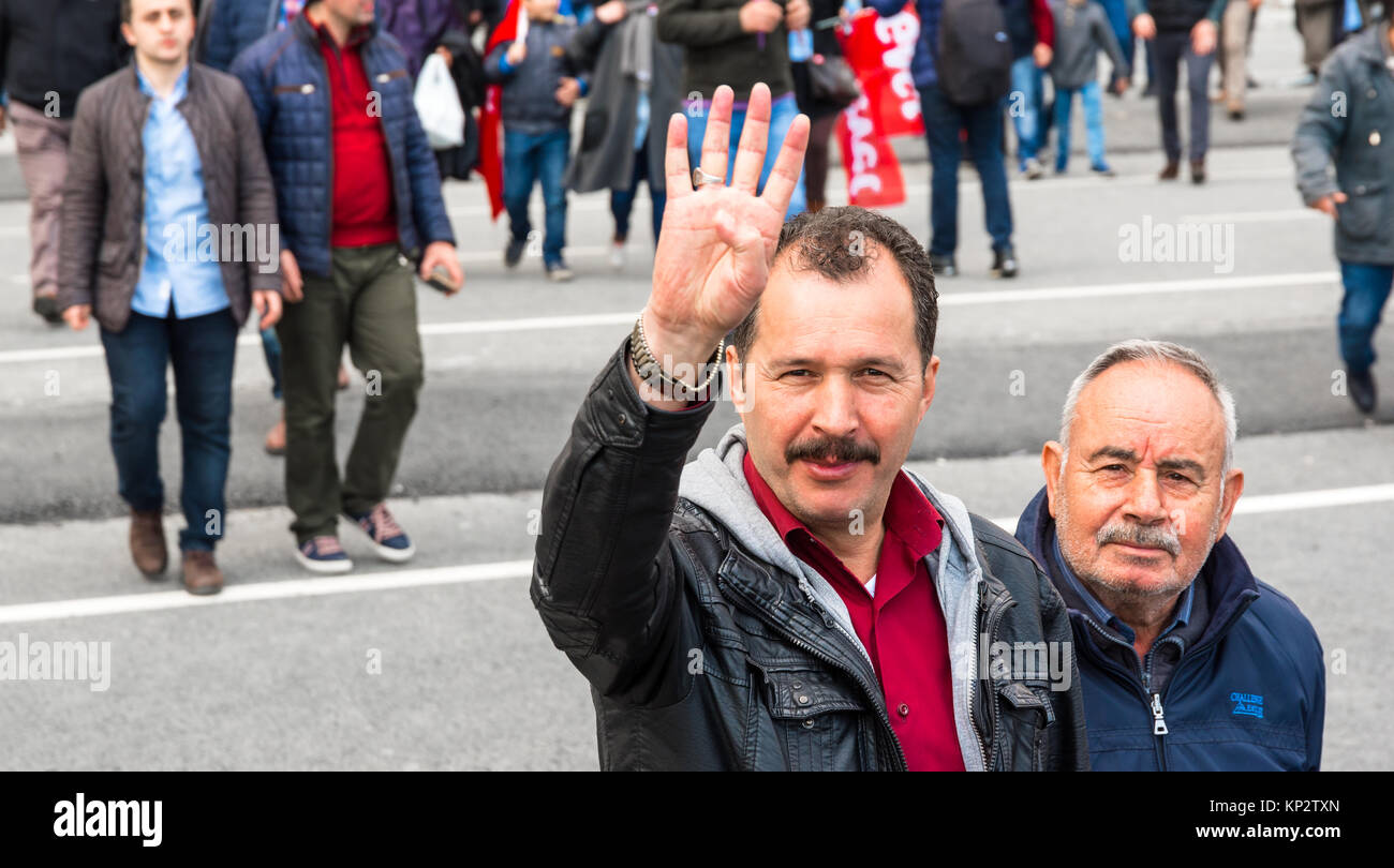 AKP (Justice and Development Party) supporters shout slogans and wave ...