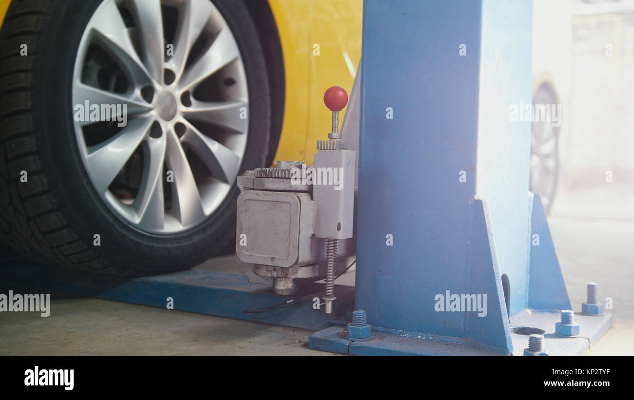 Car service work yellow drives hi-res stock photography and images - Alamy