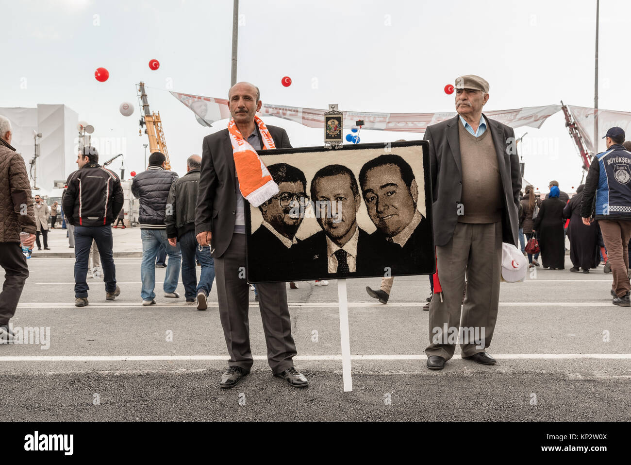 AKP (Justice and Development Party) supporters shout slogans and wave ...