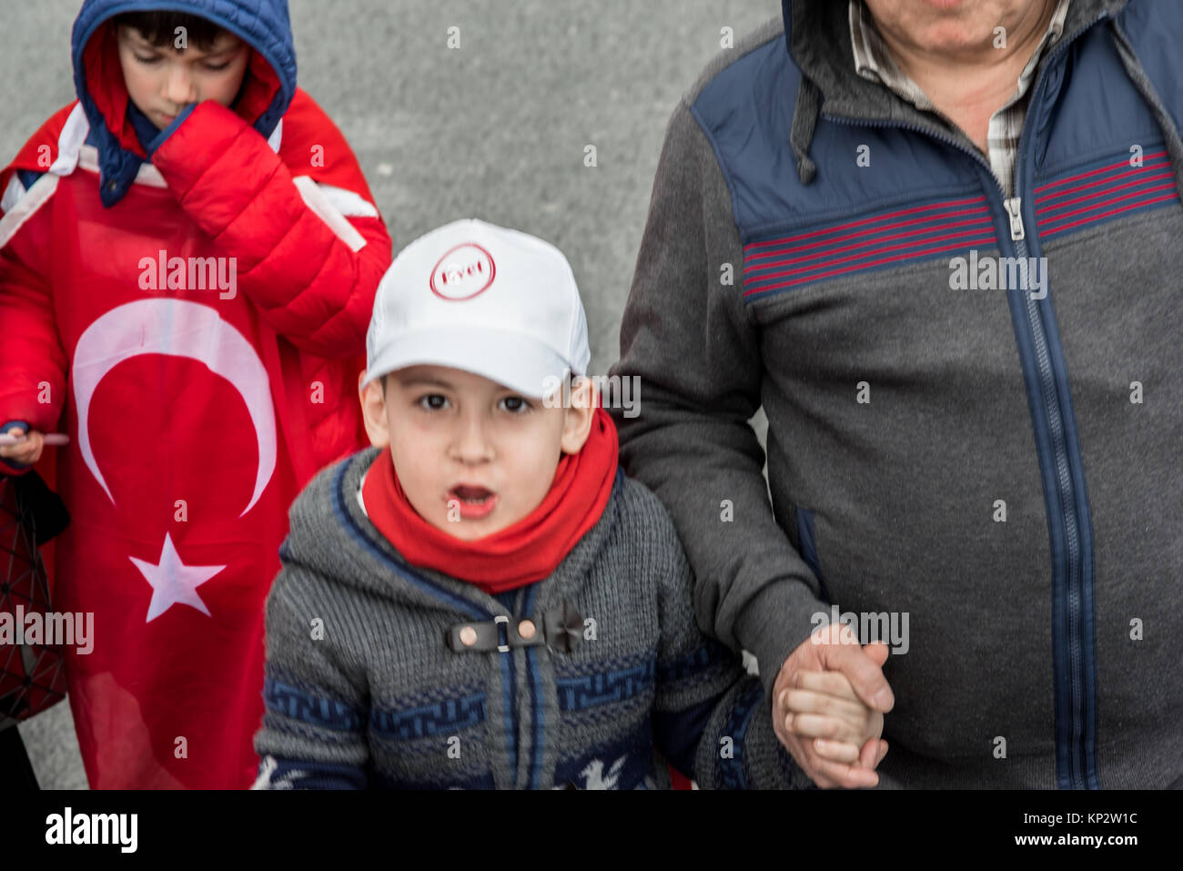 AKP (Justice and Development Party) supporters shout slogans and wave ...