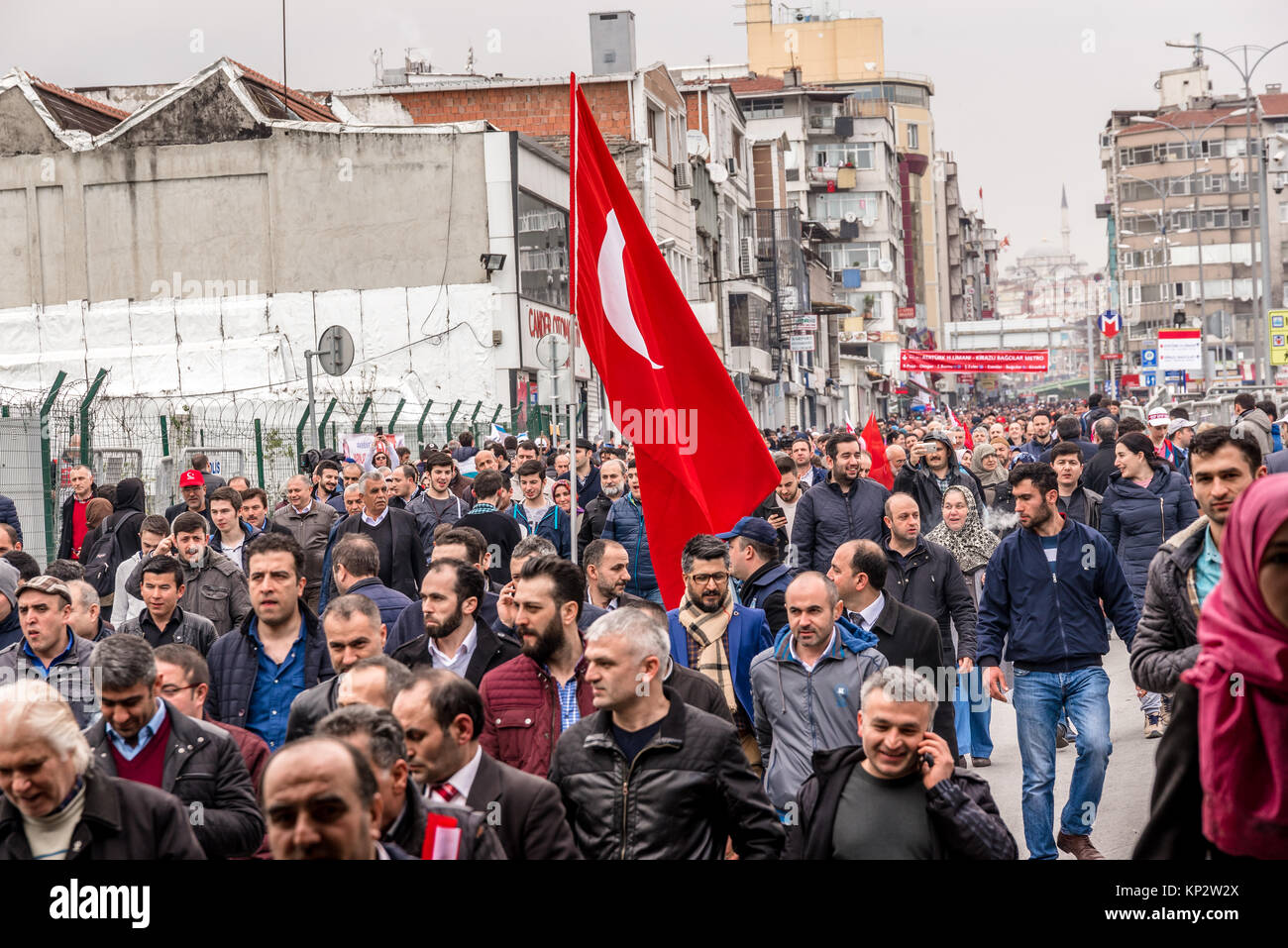 AKP (Justice and Development Party) supporters shout slogans and wave ...