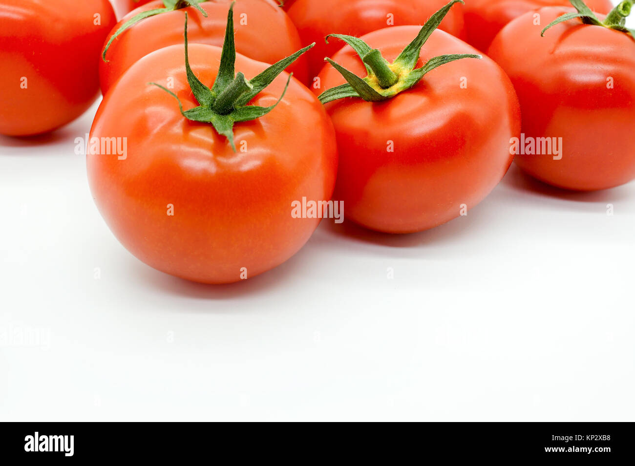 Bright red tomatos hi-res stock photography and images - Alamy