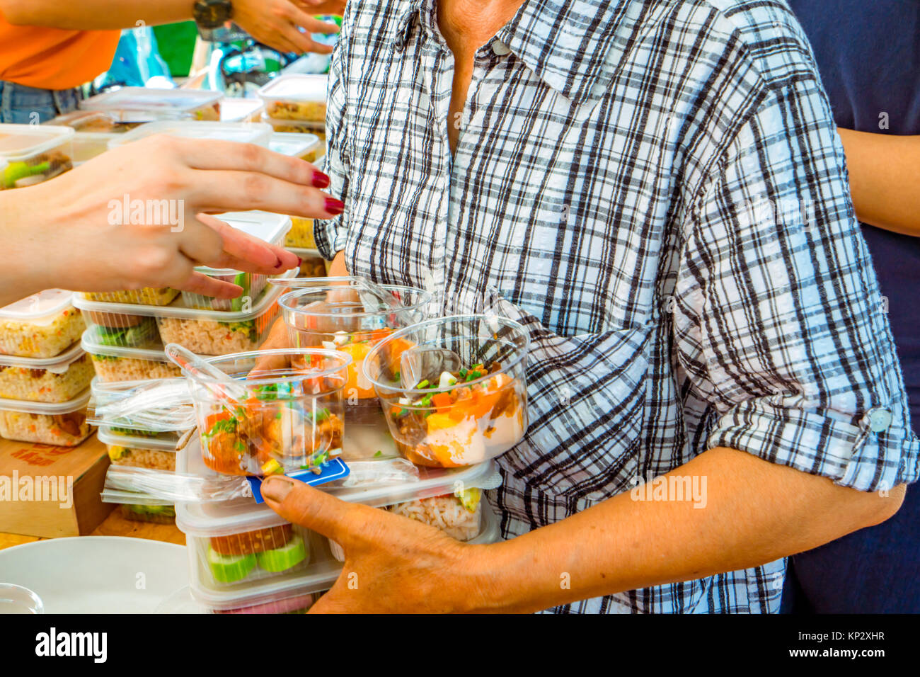 Giving Food To Poor Stock Photos & Giving Food To Poor Stock Images - Alamy