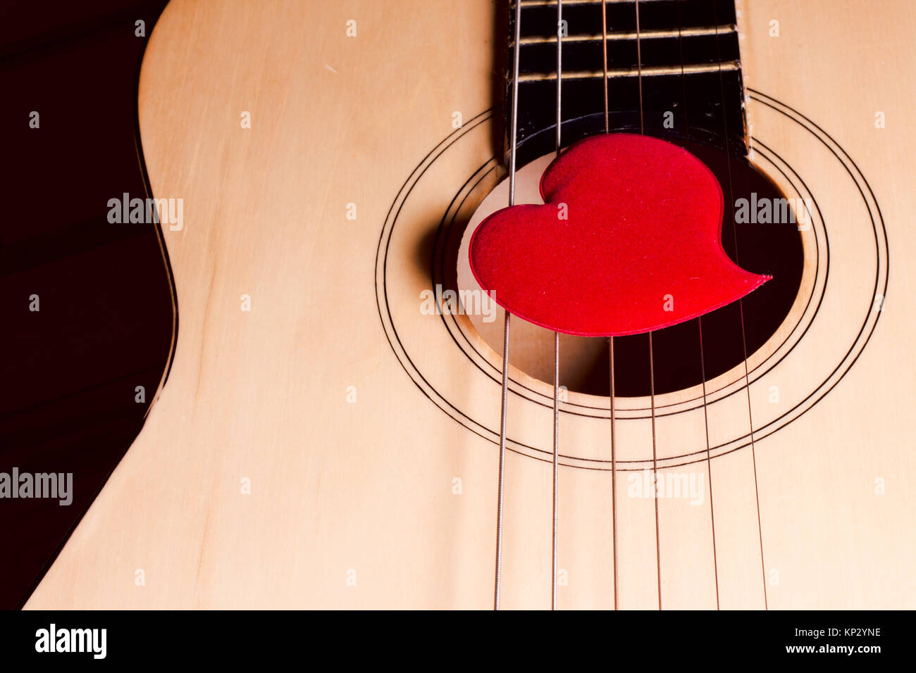 Red heart and guitar. Love music concept Stock Photo - Alamy