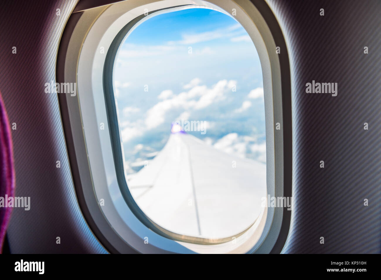 Aircraft window close-up view from the window is out of focus Stock ...